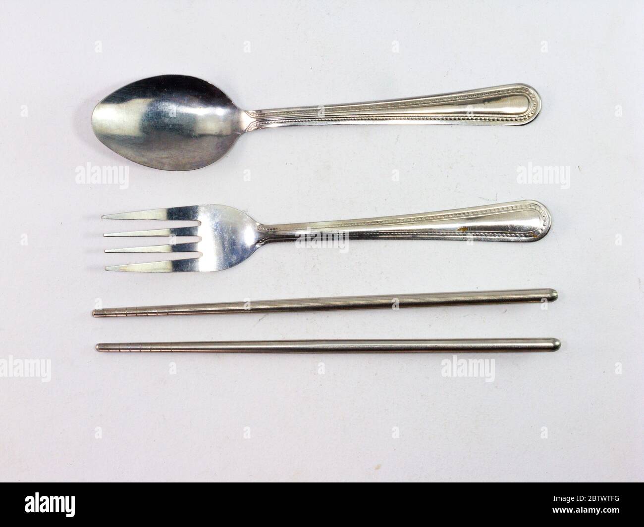 Stainless steel chopsticks hi-res stock photography and images - Alamy