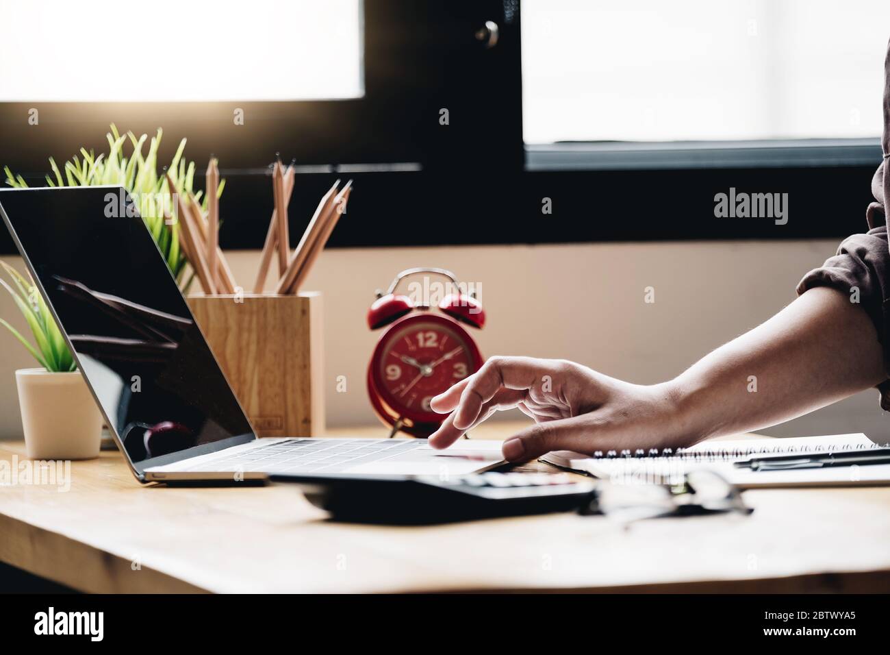 Businessman using calculator laptop financial hi-res stock photography ...
