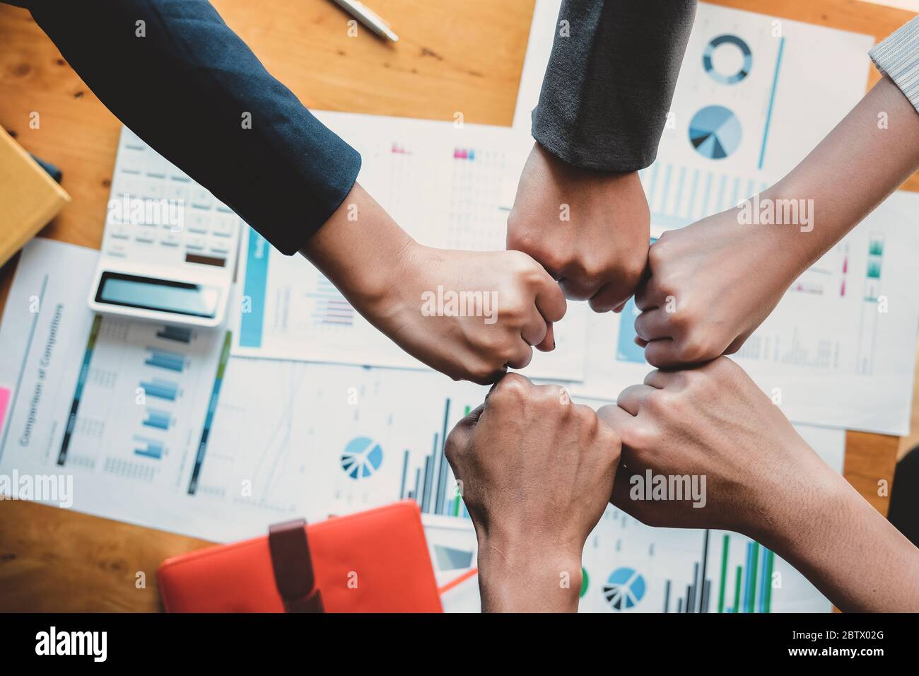 Teamwork Success. Business people group team happy showing teamwork and ...