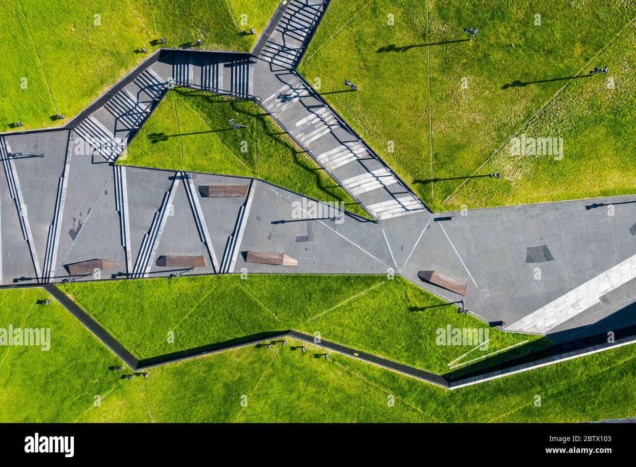 Katowice city center architecture. Aerial view of green grass terraces ...
