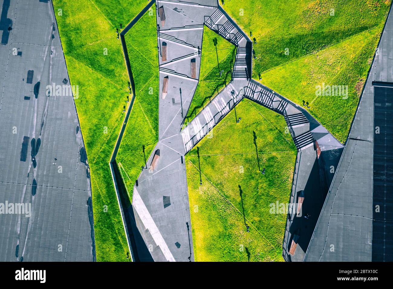 Katowice city center architecture. Aerial view of green grass terraces ...