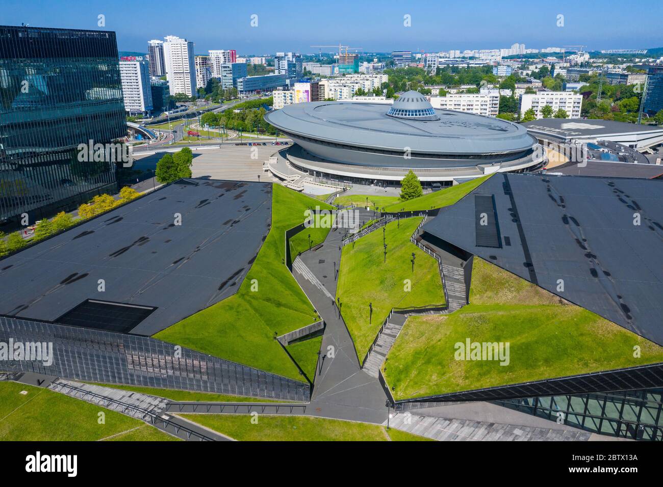 Katowice city center architecture. Aerial view of green grass terraces ...