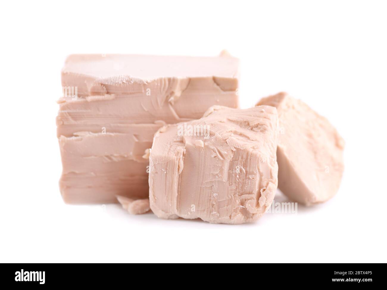 Fresh pressed yeast, isolated on white background. Compressed fresh ...