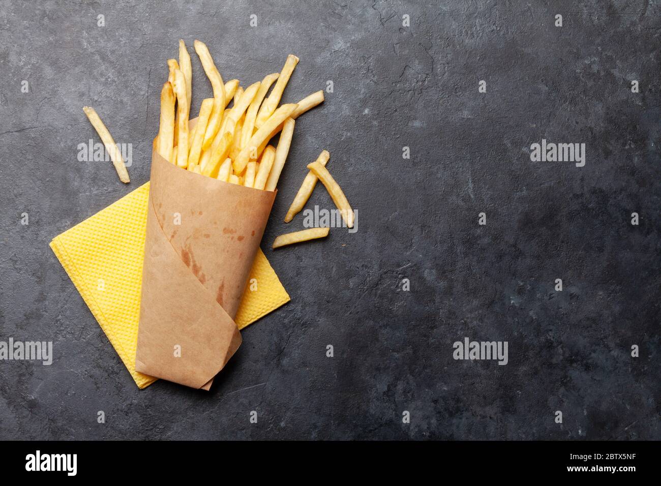 French crispy potato fries. Top view with copy space Stock Photo - Alamy