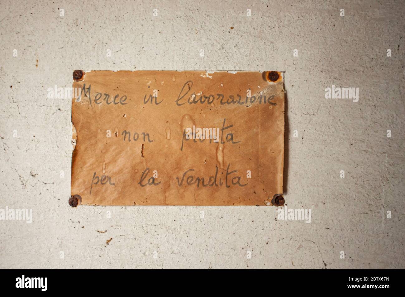 Old sign handwritten in Italian in an abandoned building Stock Photo ...