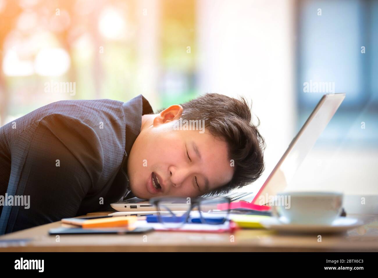 Sad businessman stressed and worried sitting in office. Stress and ...