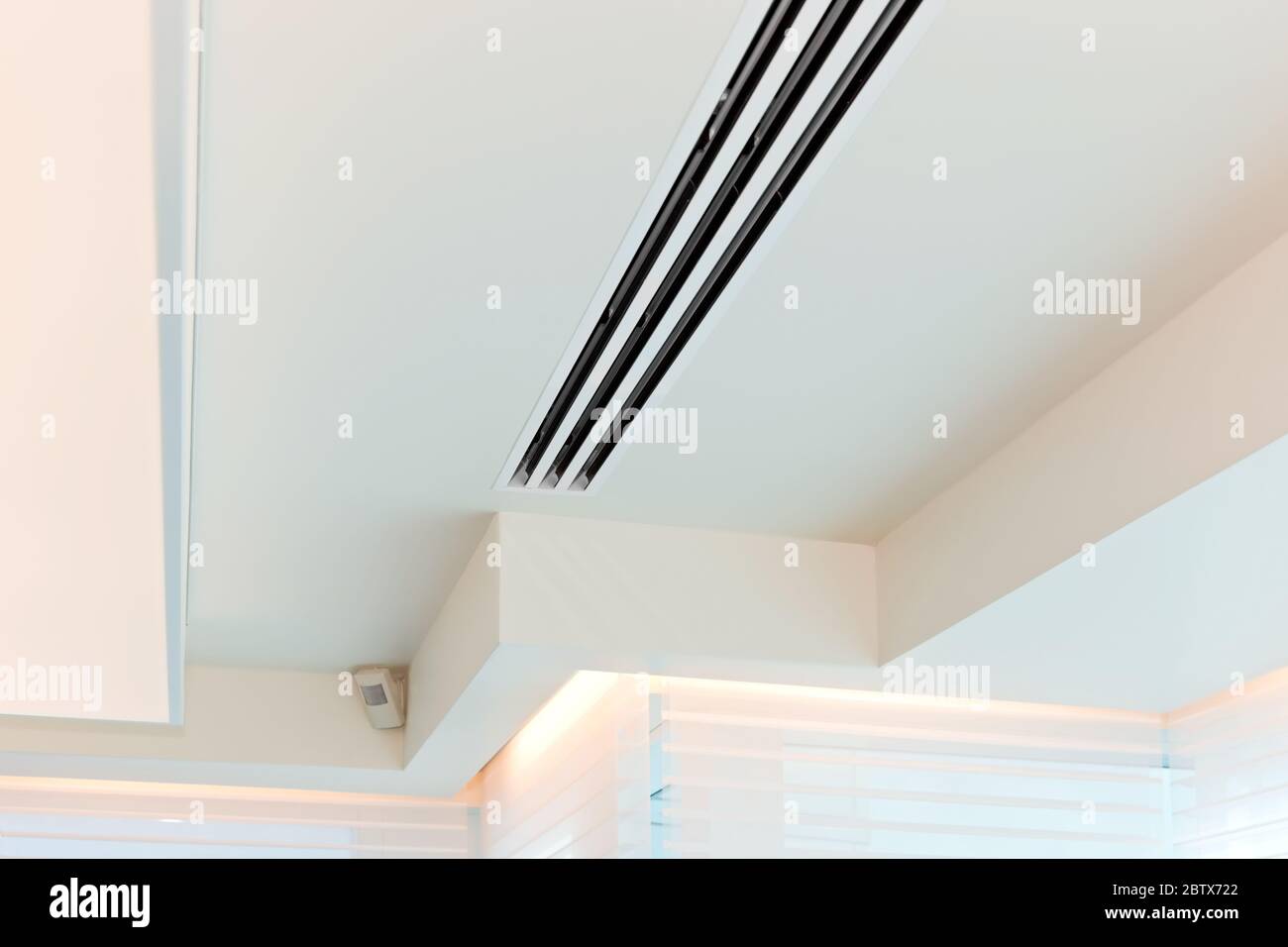 Plaster ceiling with grating the air conditioner Stock Photo - Alamy