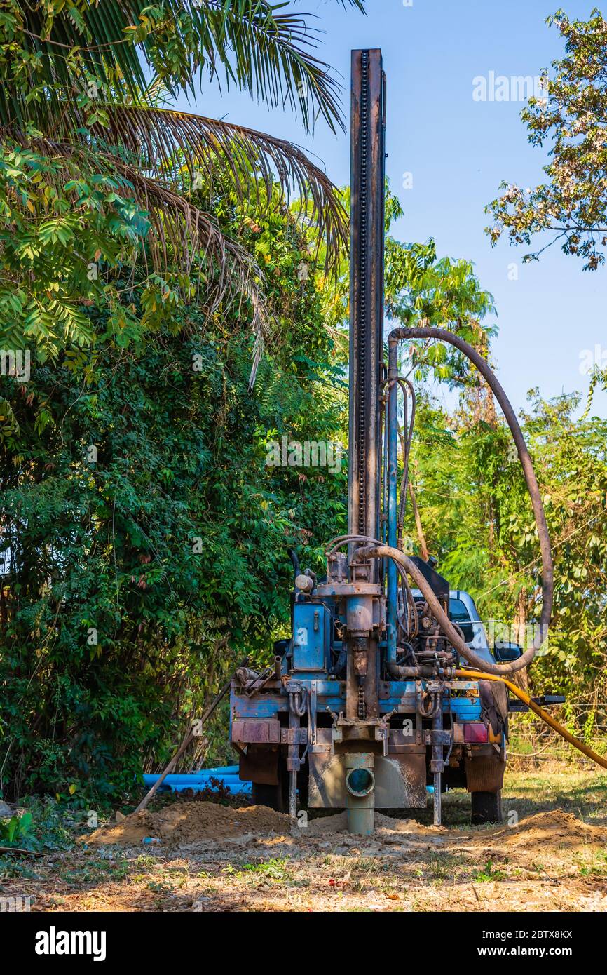 ground drilling water machine on the old truck drilling in the ground ...