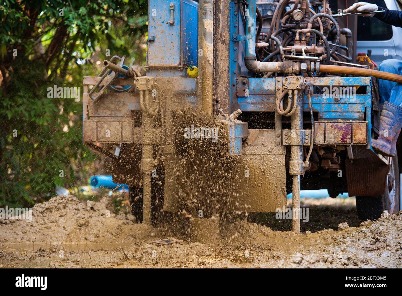 ground drilling water machine on the old truck drilling in the ground ...