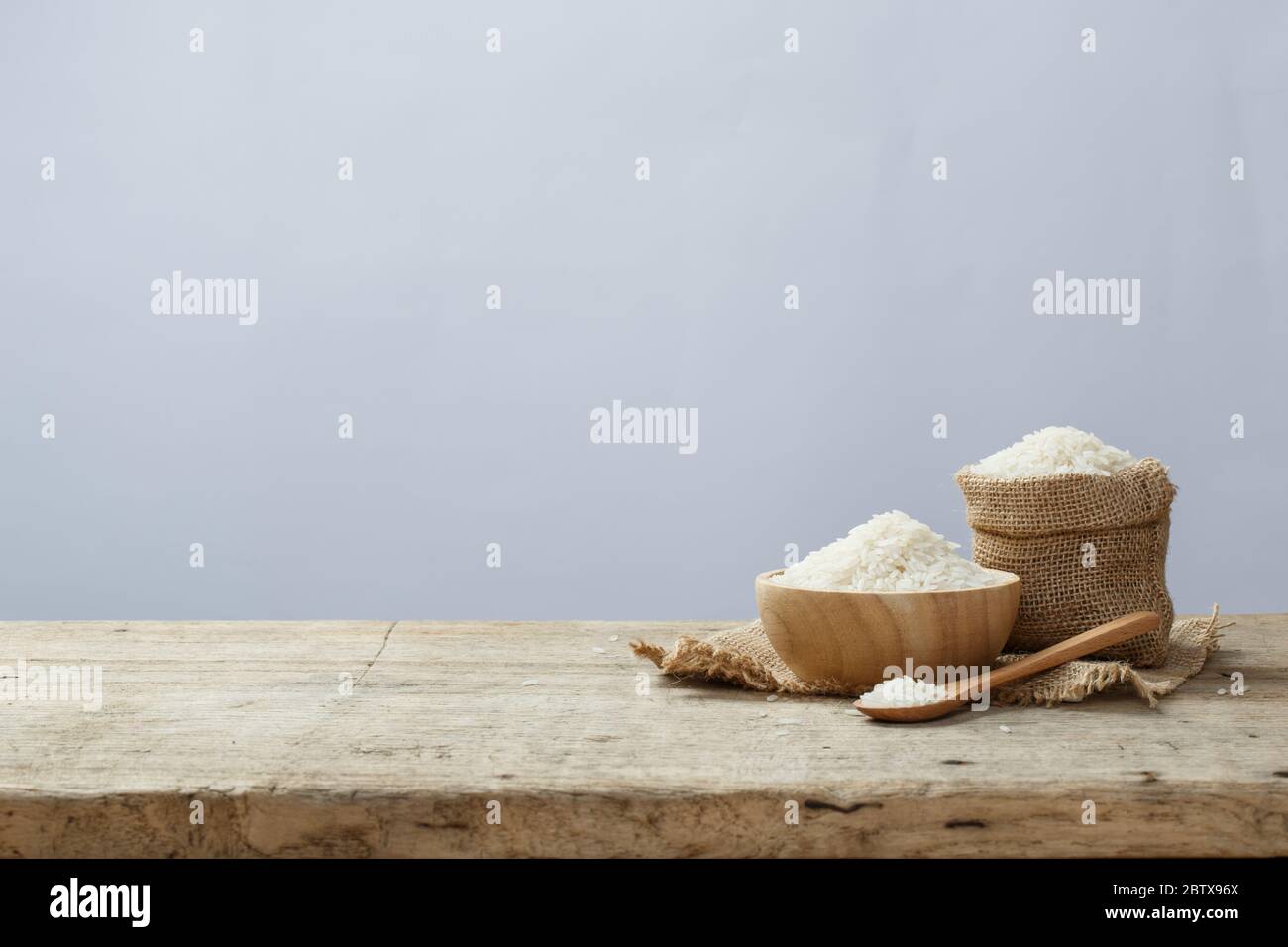 Asian white rice or uncooked white rice Stock Photo - Alamy