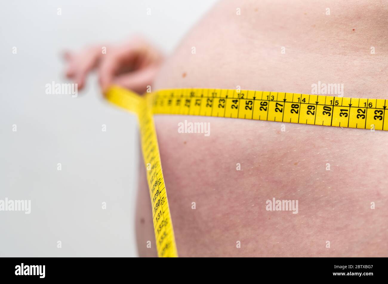 Meter measuring belly circumference at home. Pregnancy concept Stock ...