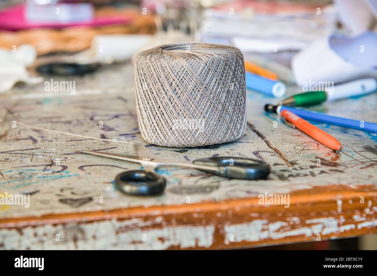 Grey color ball of threads wool in a sewing laboratory Stock Photo - Alamy