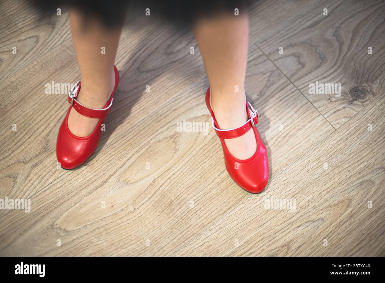Girl red shoes hi-res stock photography and images - Alamy