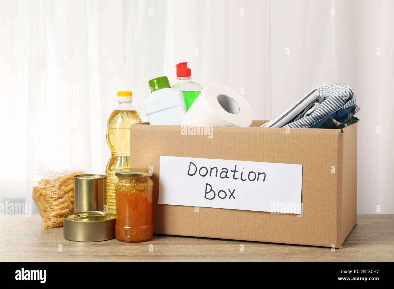 Food donation box children hi-res stock photography and images - Alamy