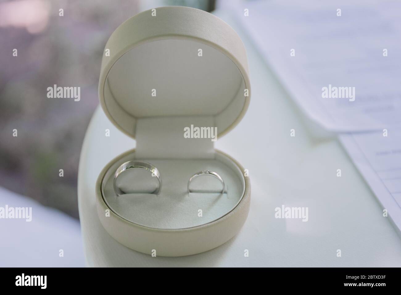wedding rings in box at the ceremony Stock Photo - Alamy