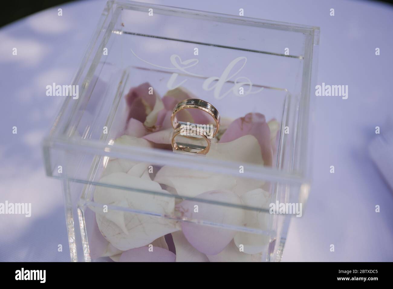 wedding rings in box at the ceremony Stock Photo - Alamy