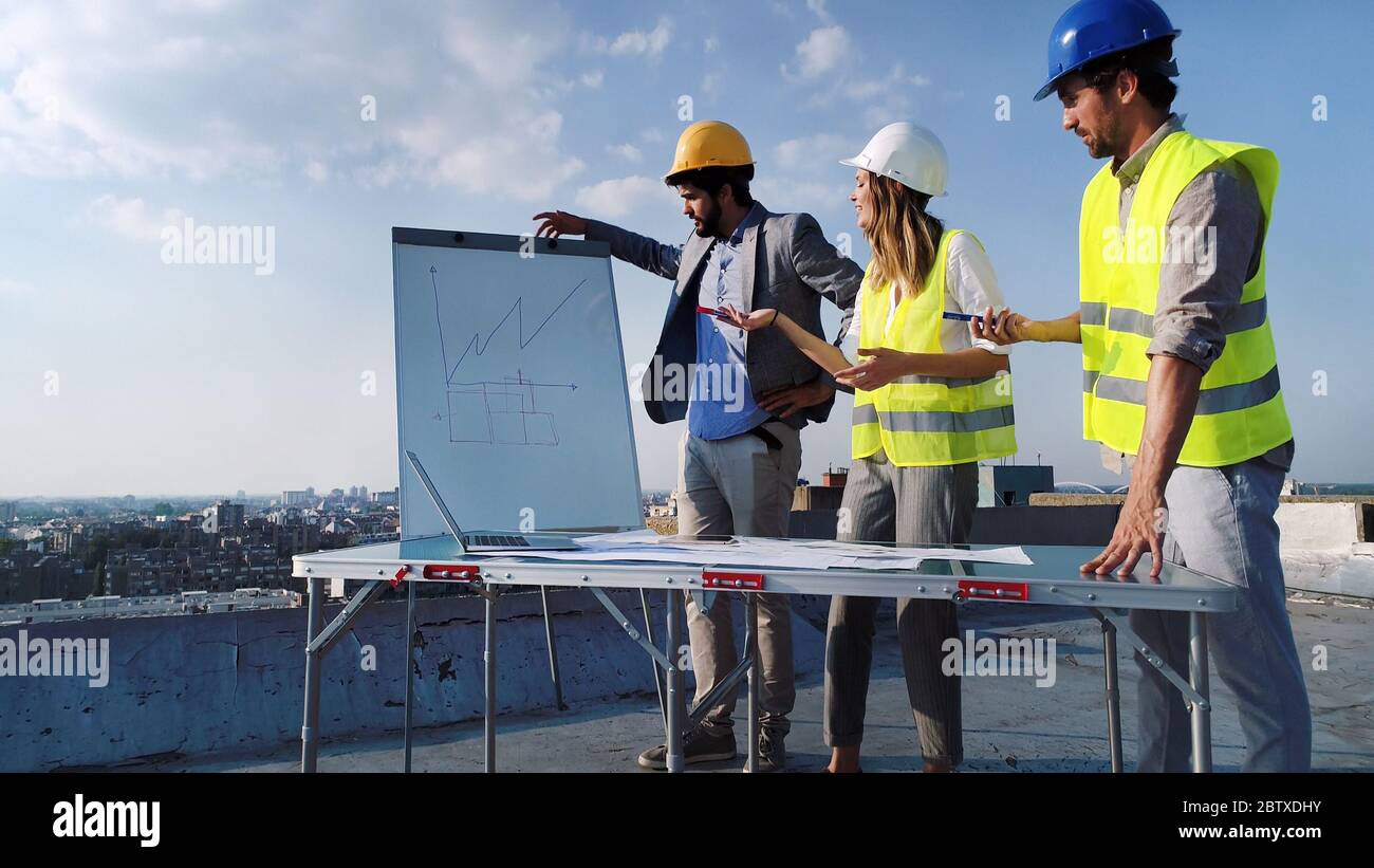 Picture of construction engineer working on building site Stock Photo ...