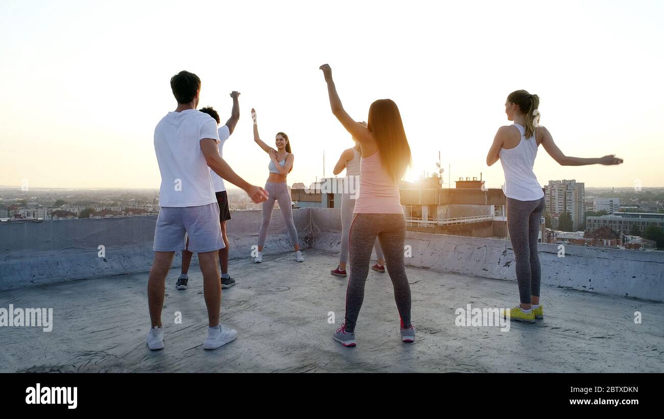 Friends fitness training together outdoors living active healthy Stock ...