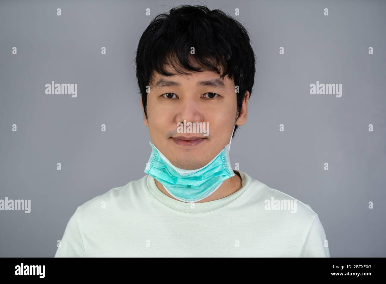 Man removes medical respiratory mask hi-res stock photography and ...