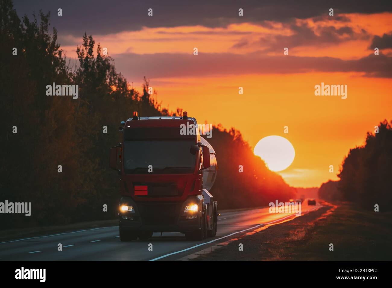 Red Truck Or Tractor Unit, Prime Mover, Traction Unit In Motion On Road ...