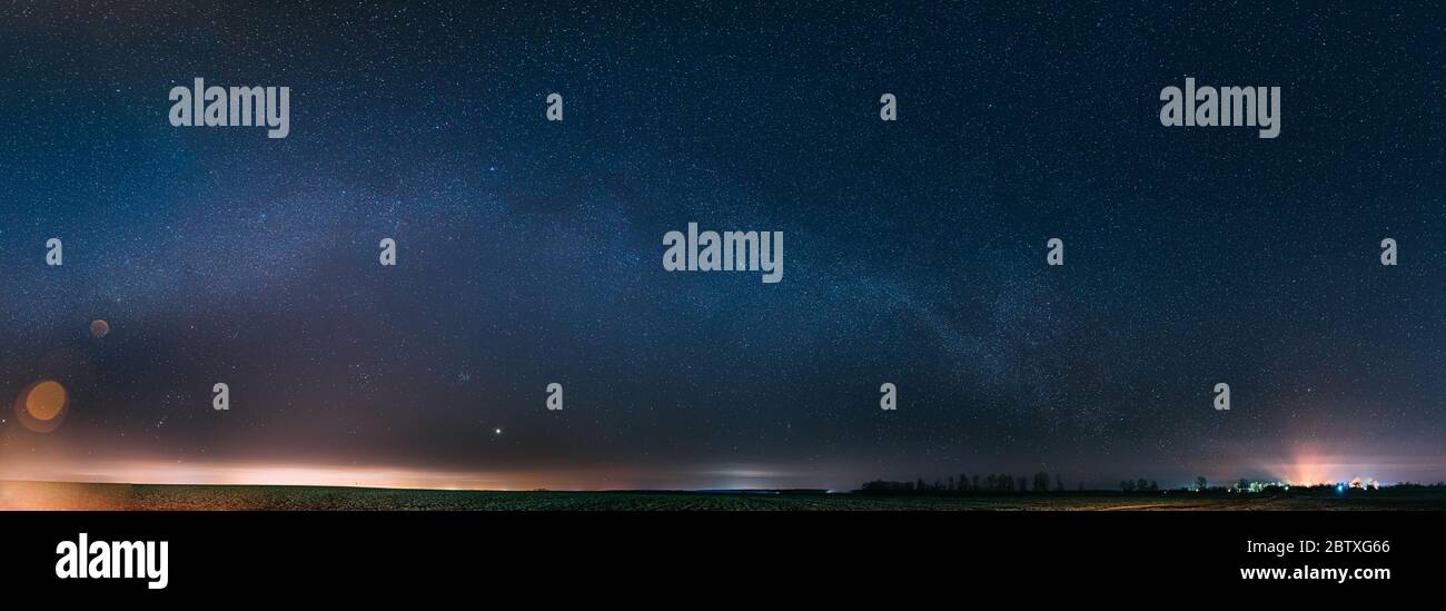 Night Starry Sky With Glowing Stars Above Countryside Landscape. Milky ...