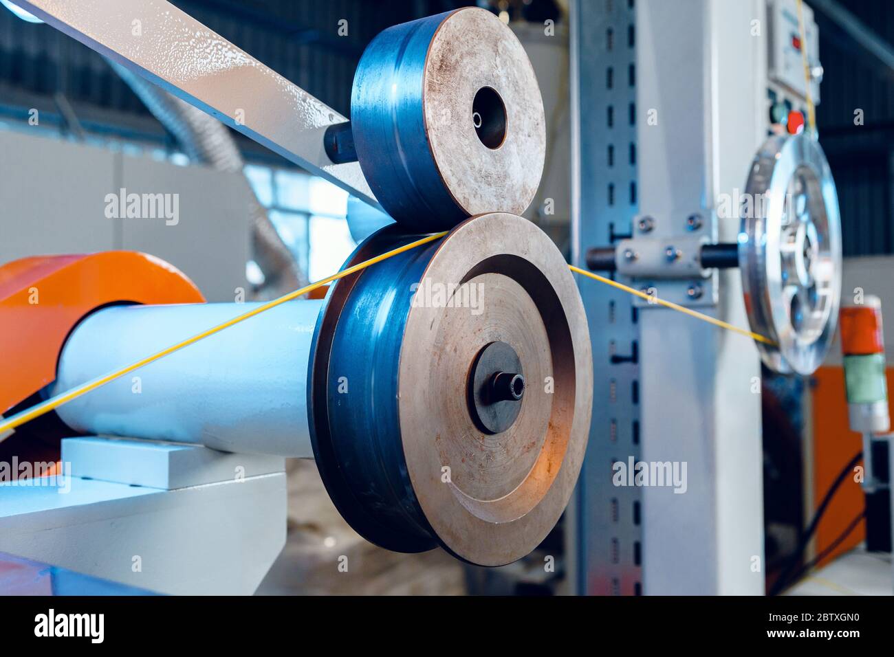 Inside a modern plant producing power electric cables and optical ...