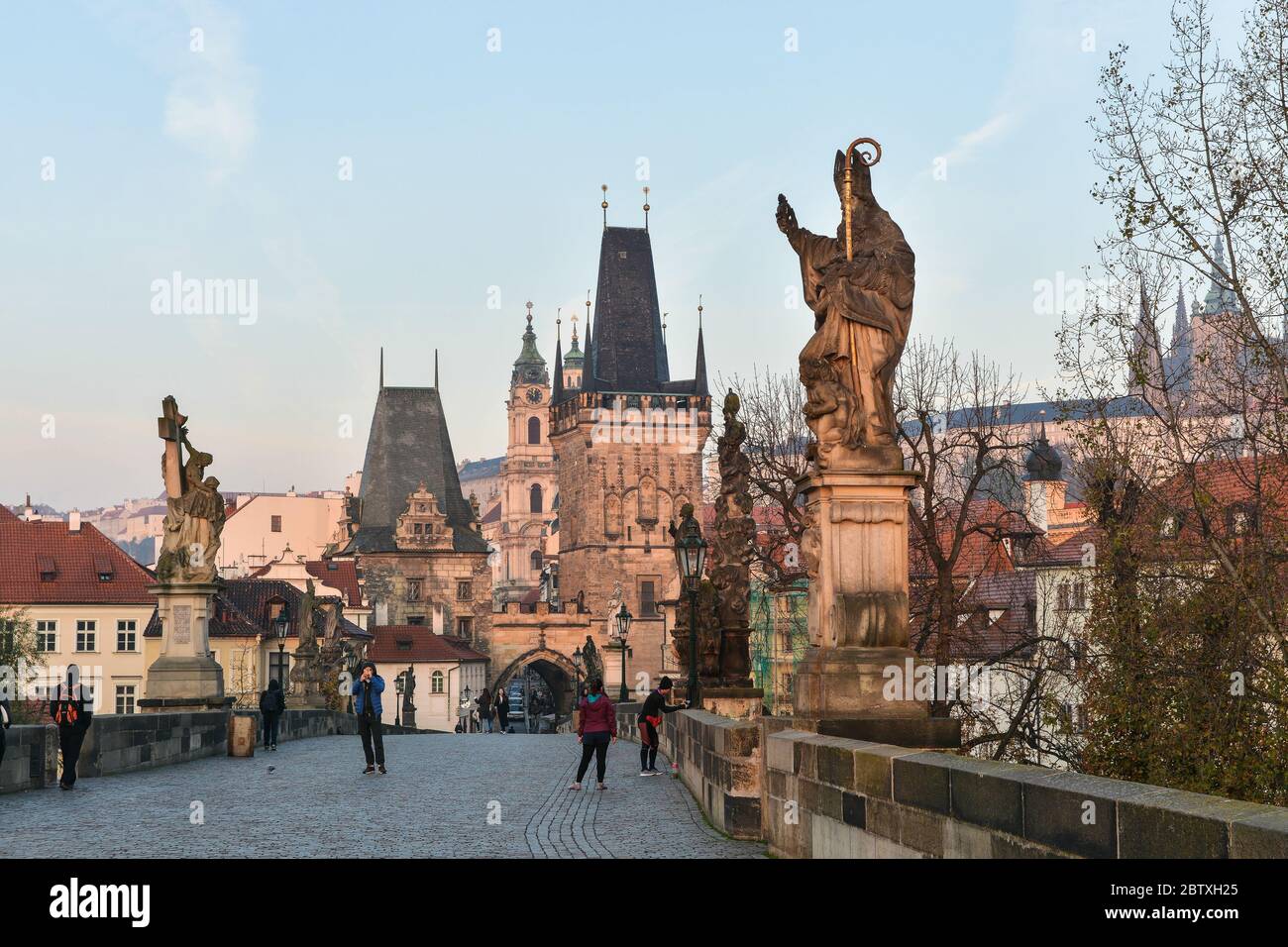 Charles bridge in the early morning. Dawn in Prague, the capital of the ...