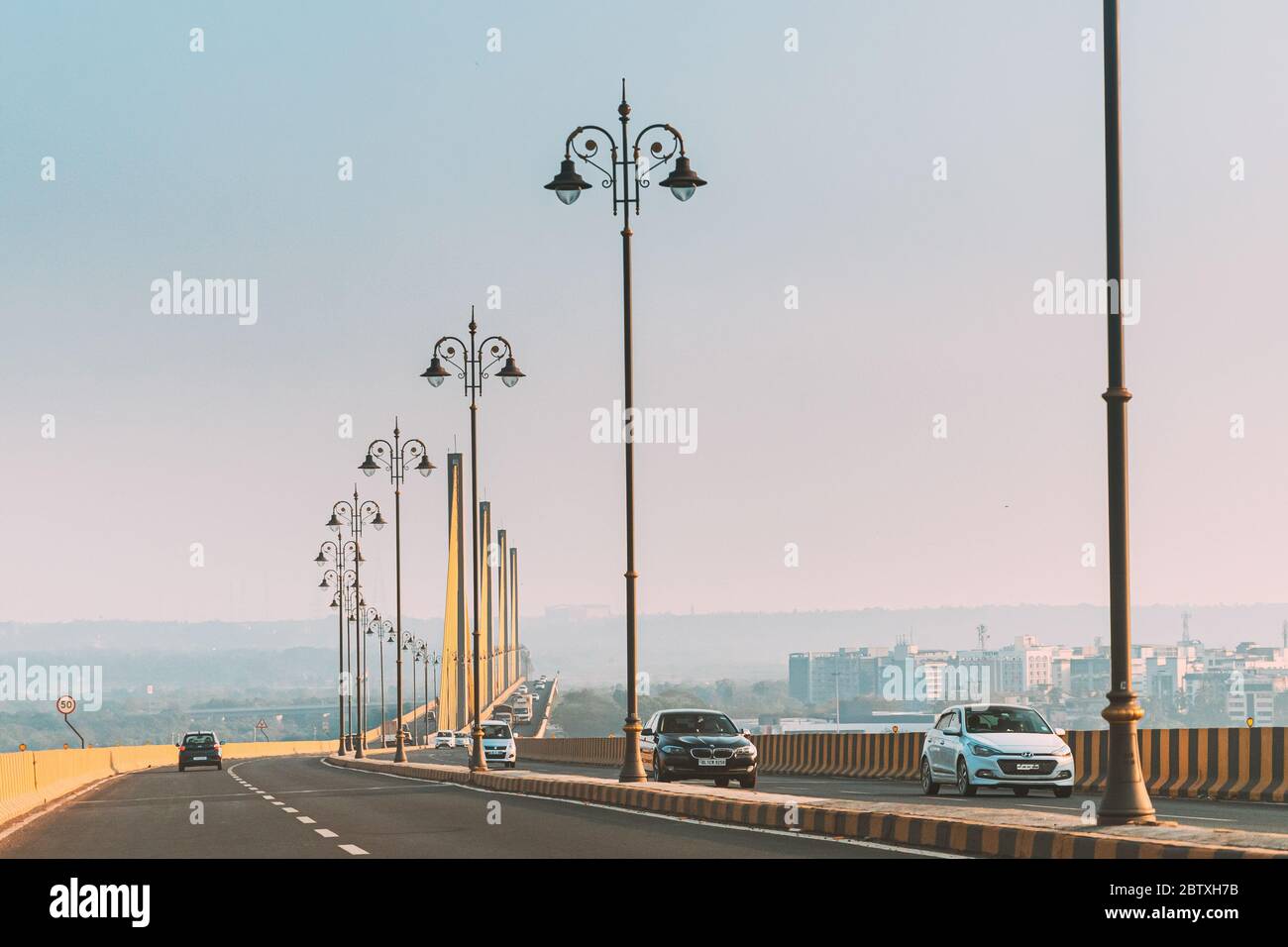 Alto Porvorim, Goa, India - February 19, 2020: Traffic moves on the ...
