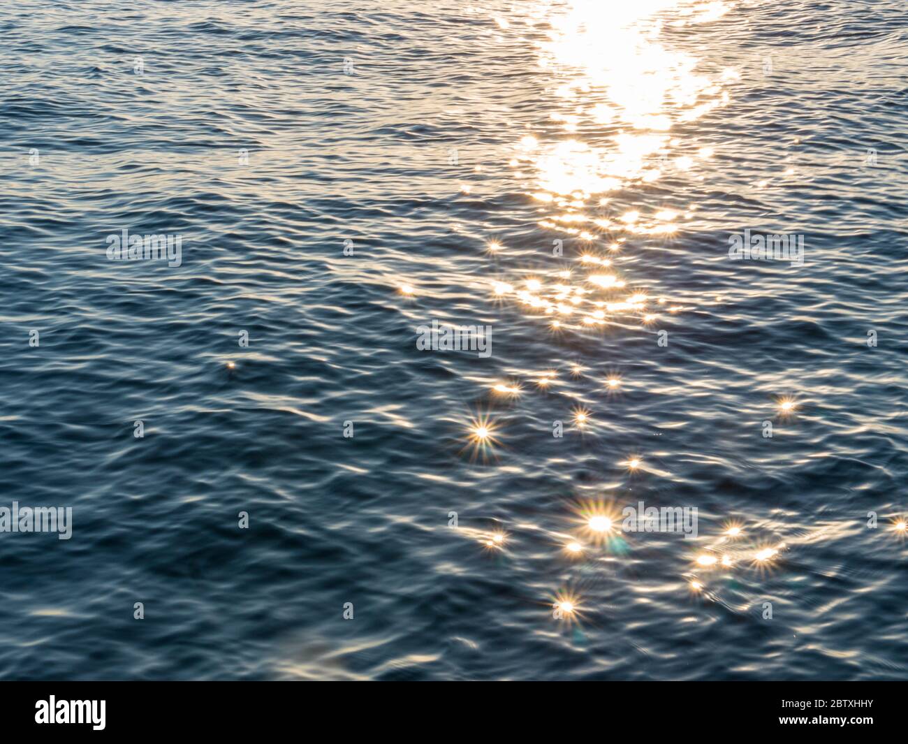 Ripple on the surface of the sea water close-up Stock Photo - Alamy