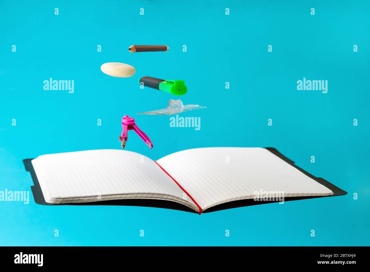 Levitating school supplies for math - notebook, pen, ruler, pencil ...