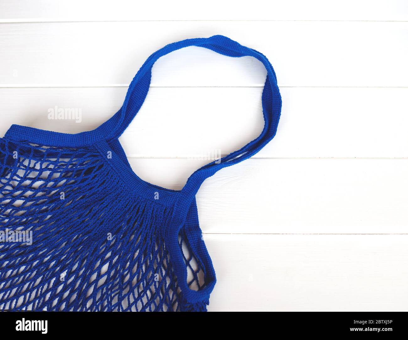 Empty blue net bag hi-res stock photography and images - Alamy