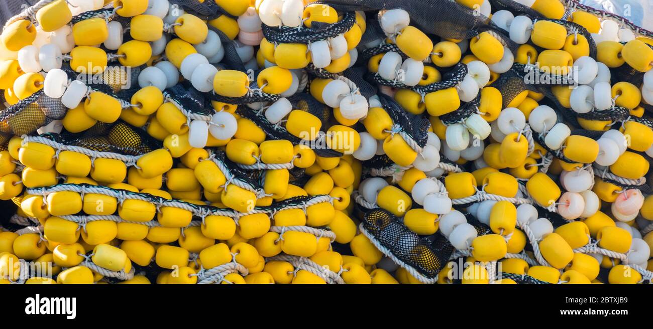 Close-up of fishing net and floats background. fishing industry Stock ...