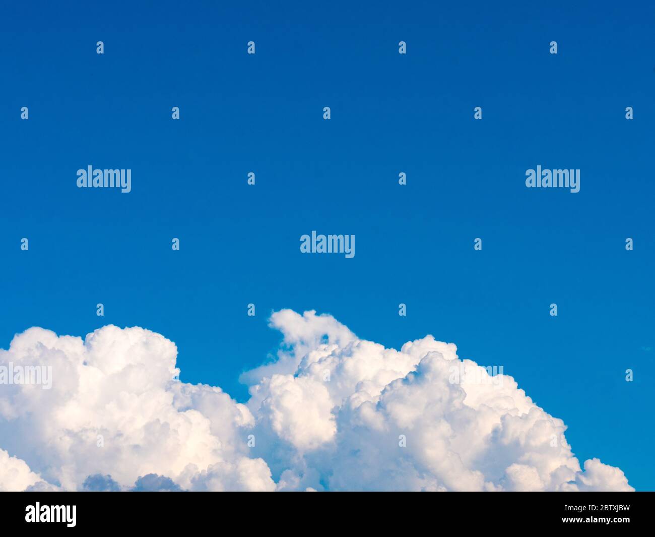 Blue sky background with white clouds. Nature Stock Photo - Alamy