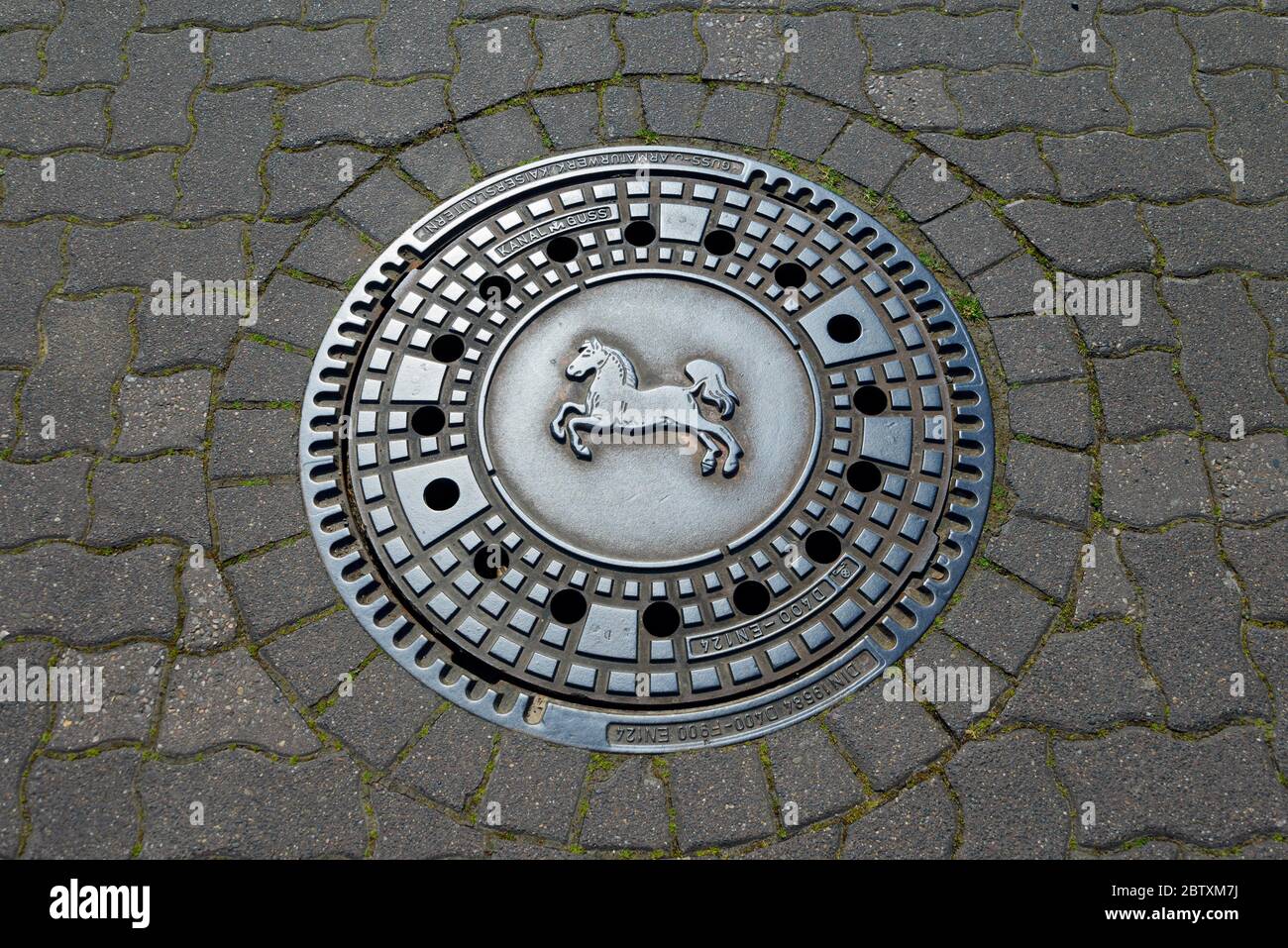 Manhole cover with niedersachsenross hi-res stock photography and ...
