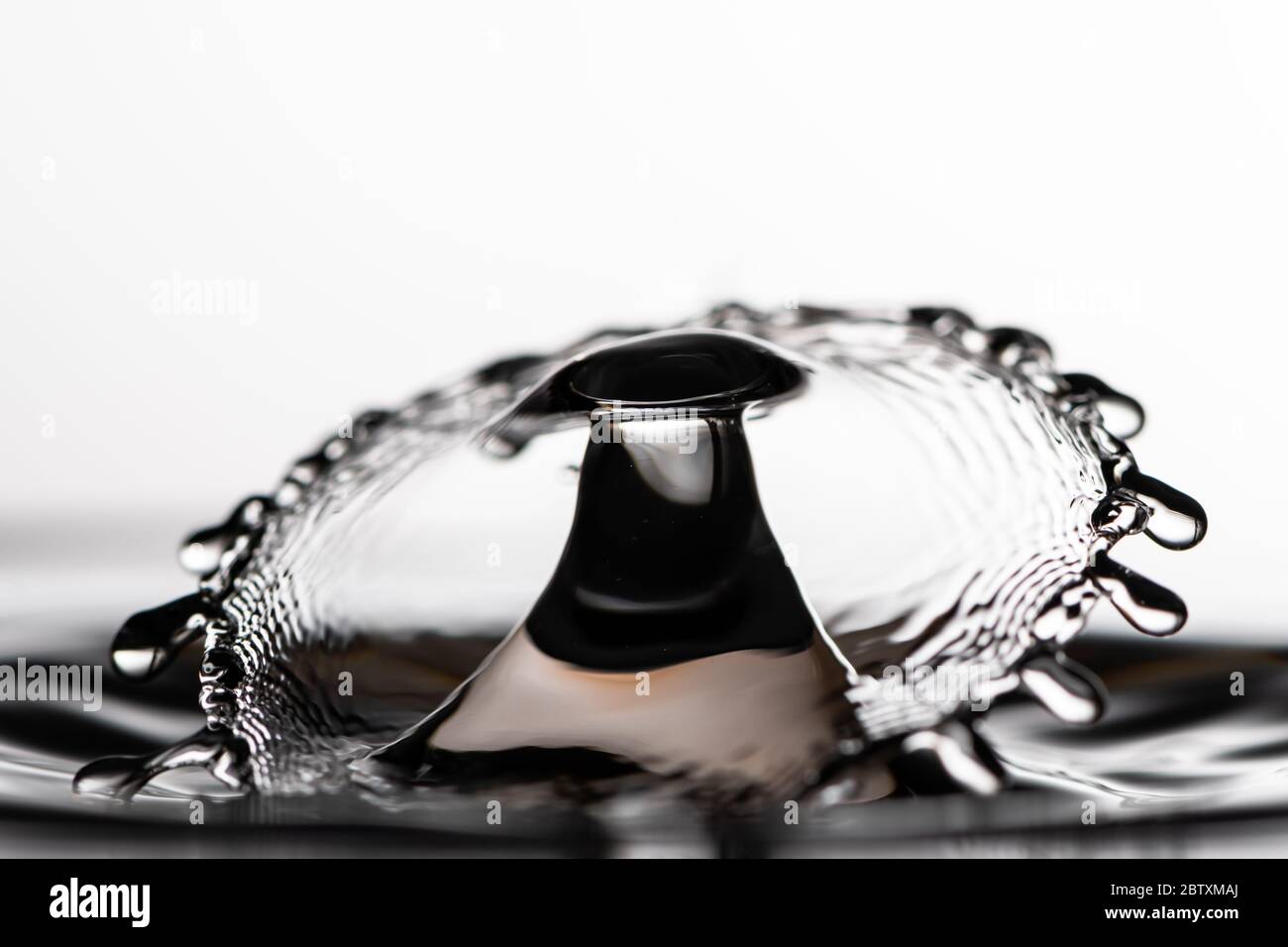 Water drop hitting water surface hi-res stock photography and images ...