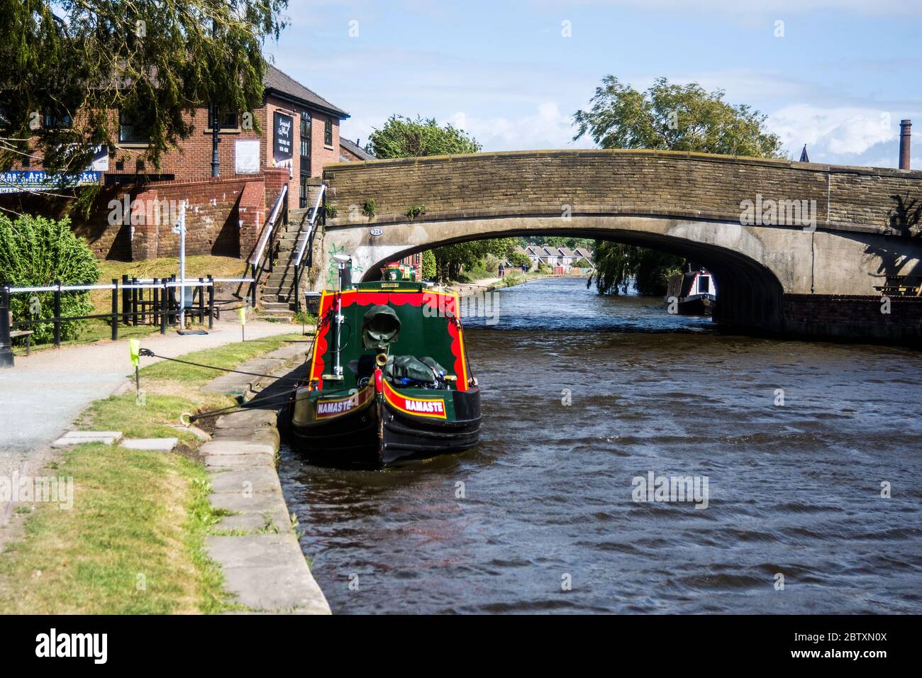 The bridge spans the Leeds - Liverpool canal at Burscough Wharf ...