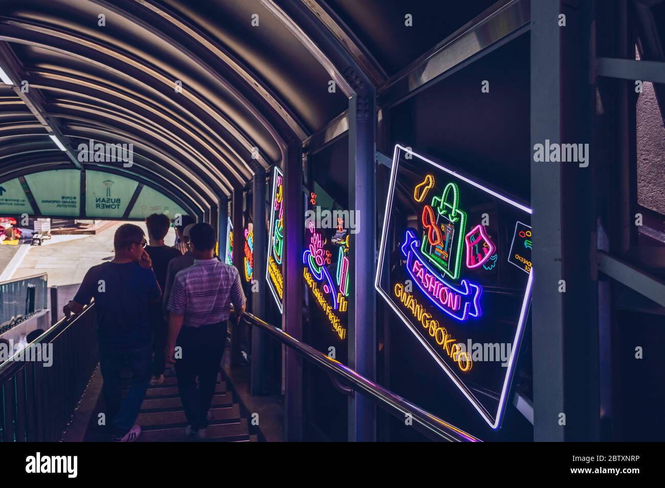 Busan, South Korea, September 14, 2019: people going down roofed ...