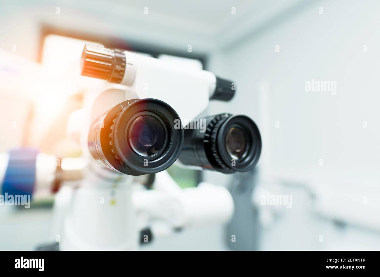 Dental endodontic binocular microscope. Closeup of a dentist microscope ...
