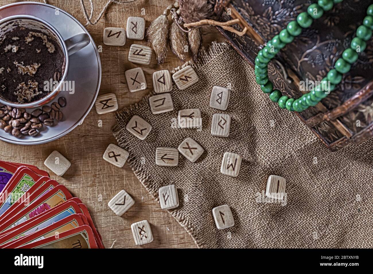 Isoteric concept of divination and prediction. Tarot cards, runes ...