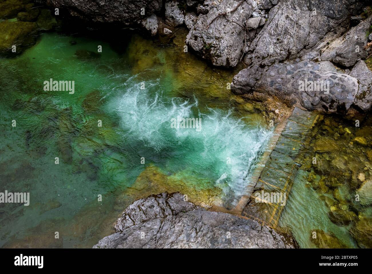 Clear Mountain River Flows Over Dam Between Rocks Stock Photo - Alamy