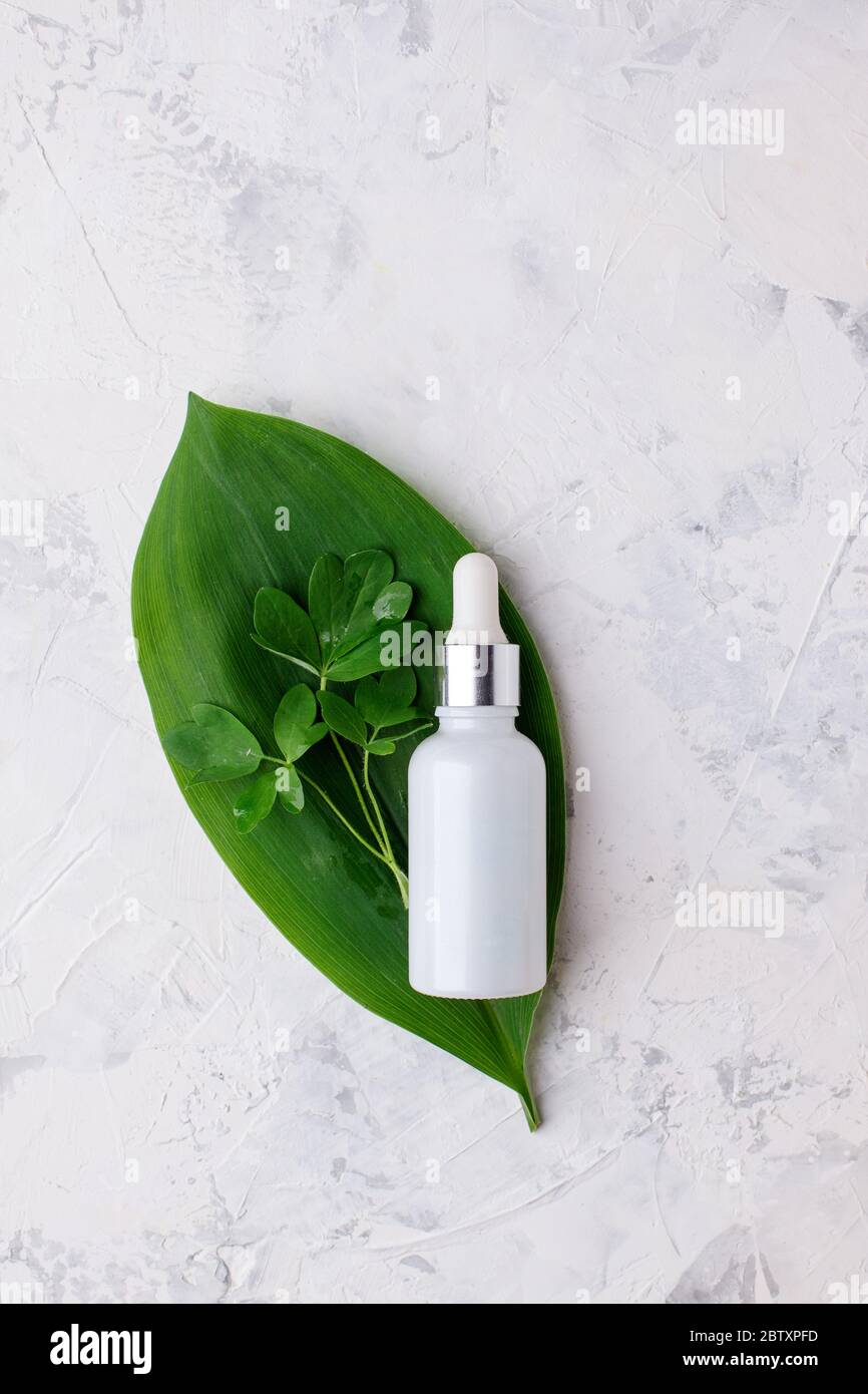 Natural Serums in white glass bottle. Concept of cosmetic injection is ...