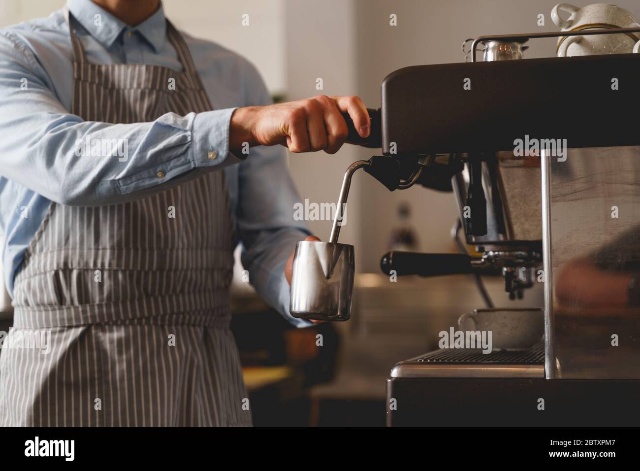 Bartender making fresh coffee with professional coffee machine Stock ...