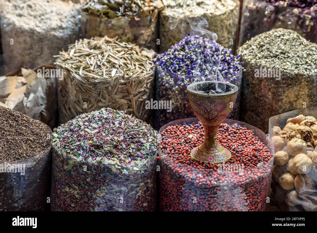 Colourful spices set out in a traditional Arabian Souk. The soul is ...