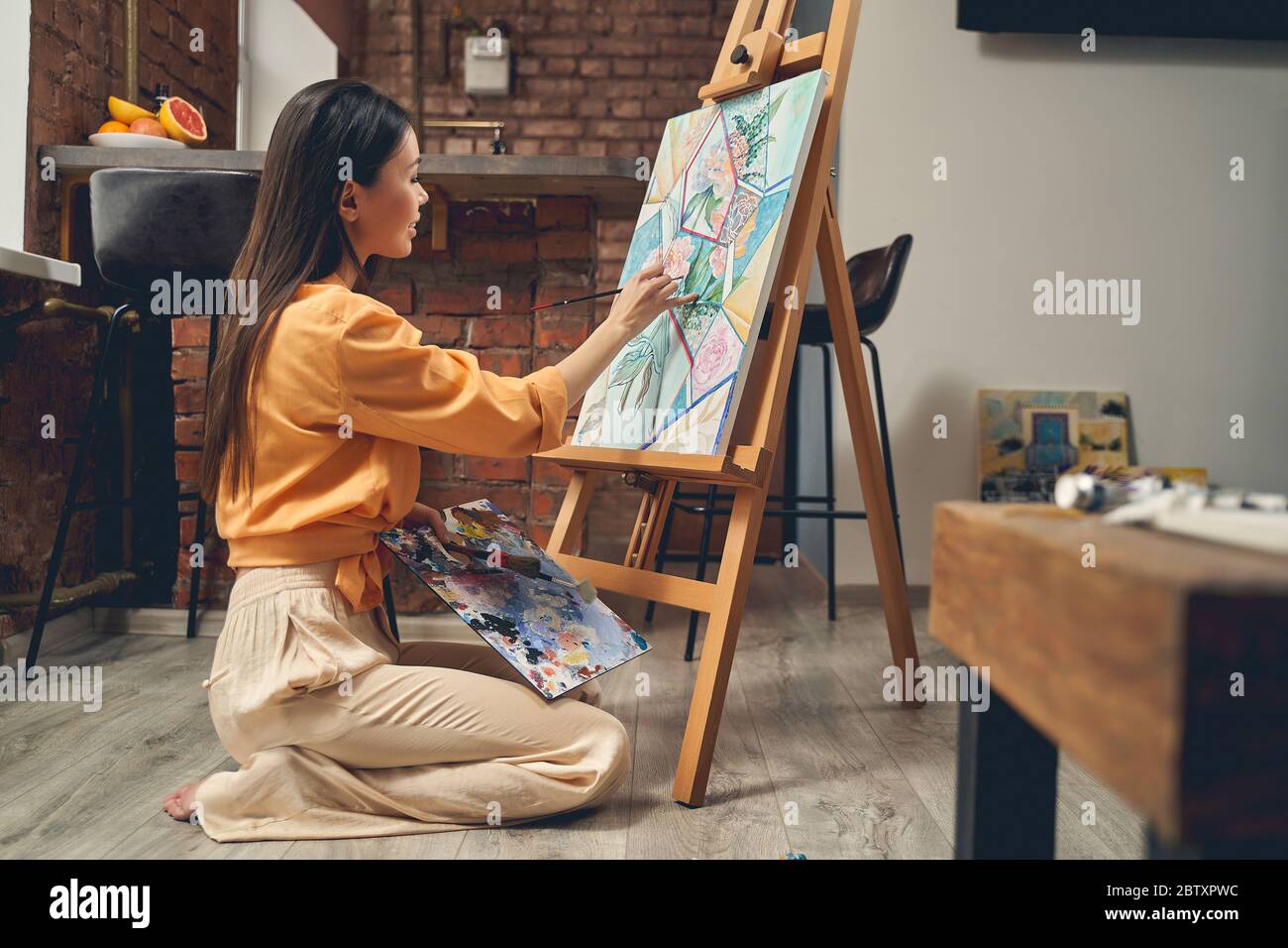 Talented female artist drawing paint hi-res stock photography and ...