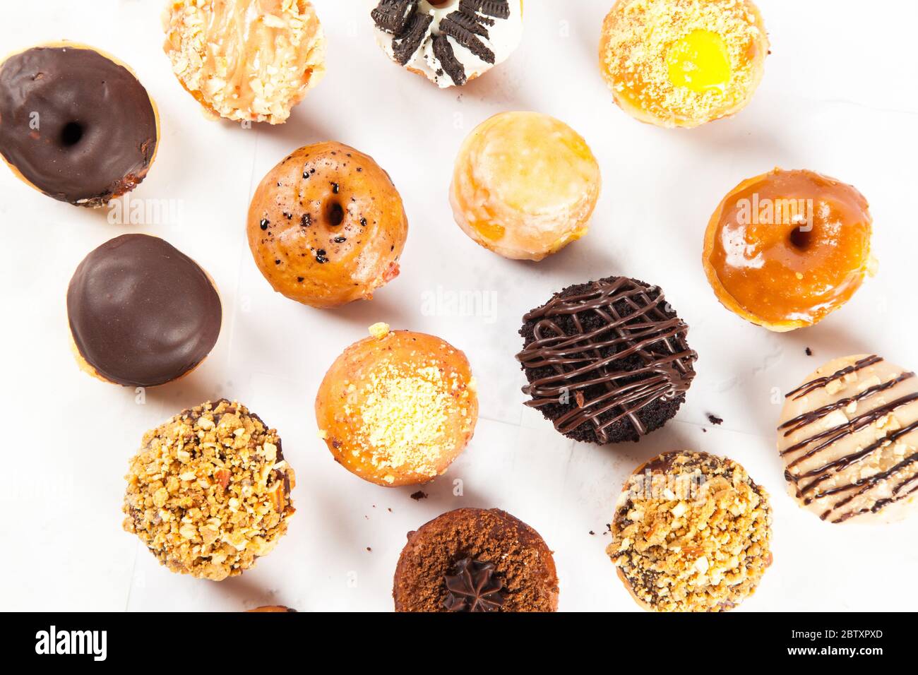 Mini assorted flavours donuts group Stock Photo - Alamy