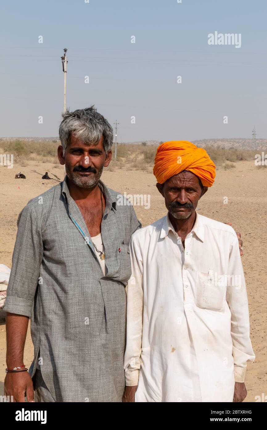 Portrait of a man from Jaisalmer standing in the thar desert with ...