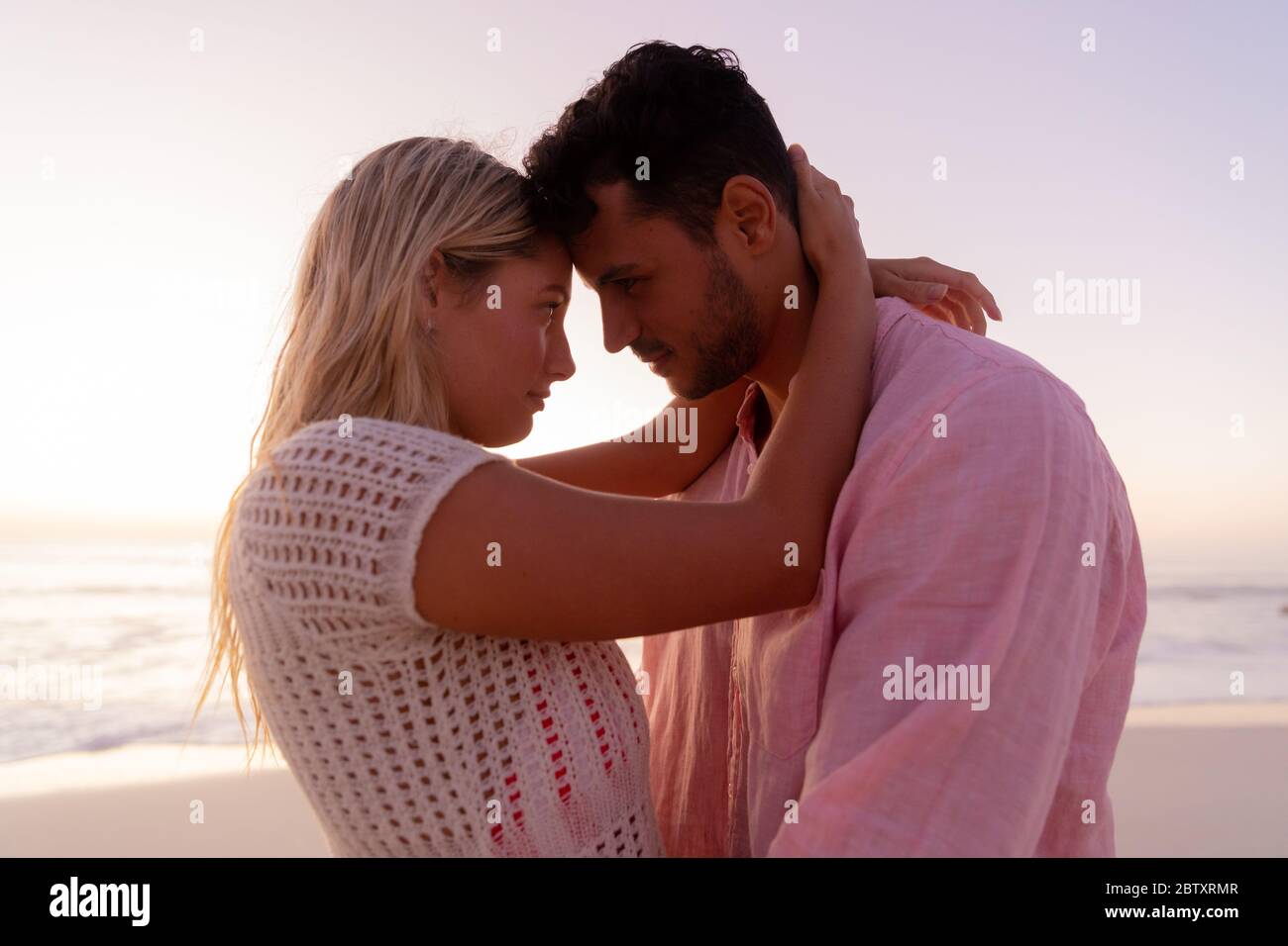 Two people foreheads touching hi-res stock photography and images - Alamy