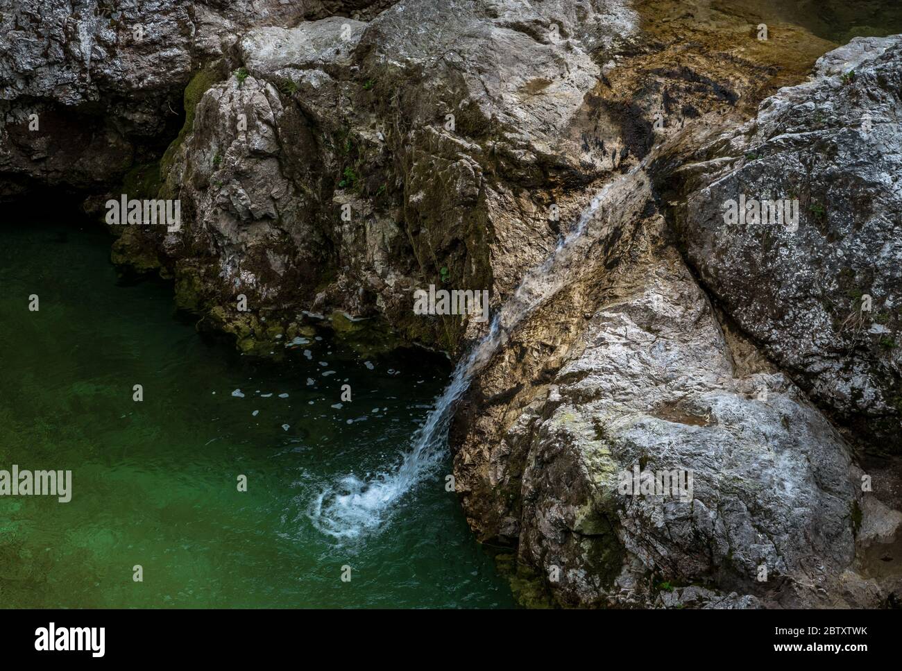 Clear And Fresh Water Flows From Mountain Spring Into River Stock Photo ...
