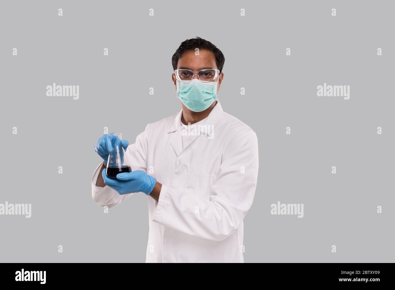 Indian Man Doctor Blood Tube High Resolution Stock Photography and ...