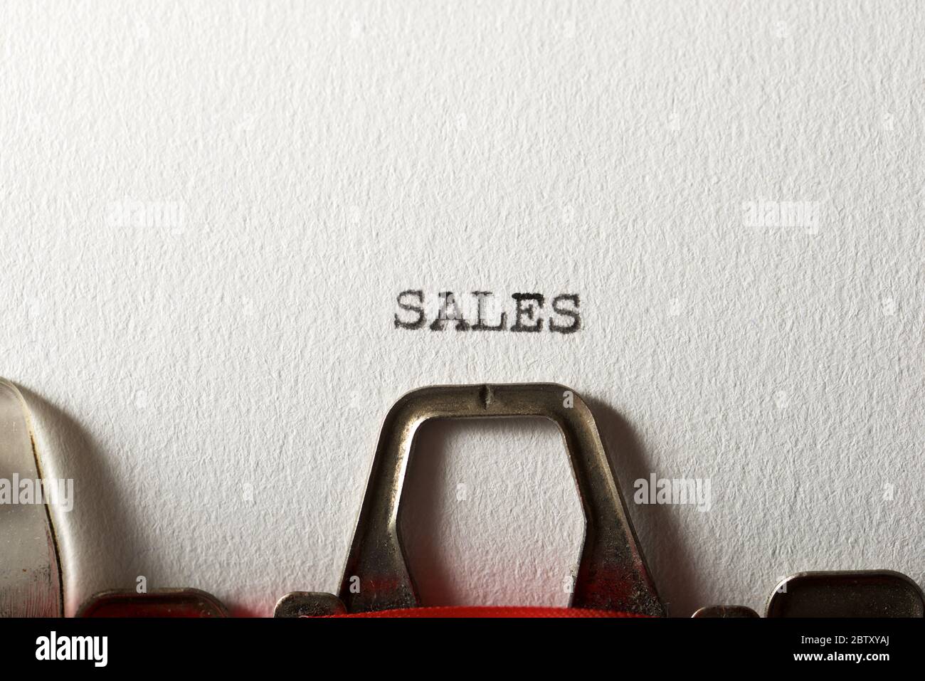 The word Sales written with a typewriter Stock Photo - Alamy